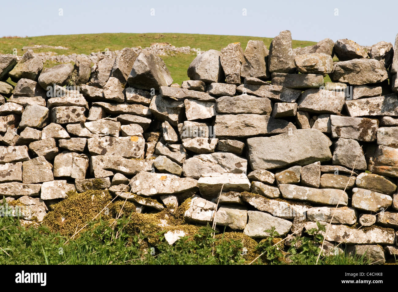 dry stone wall walls walling pile piles of stones dividing field fields ...