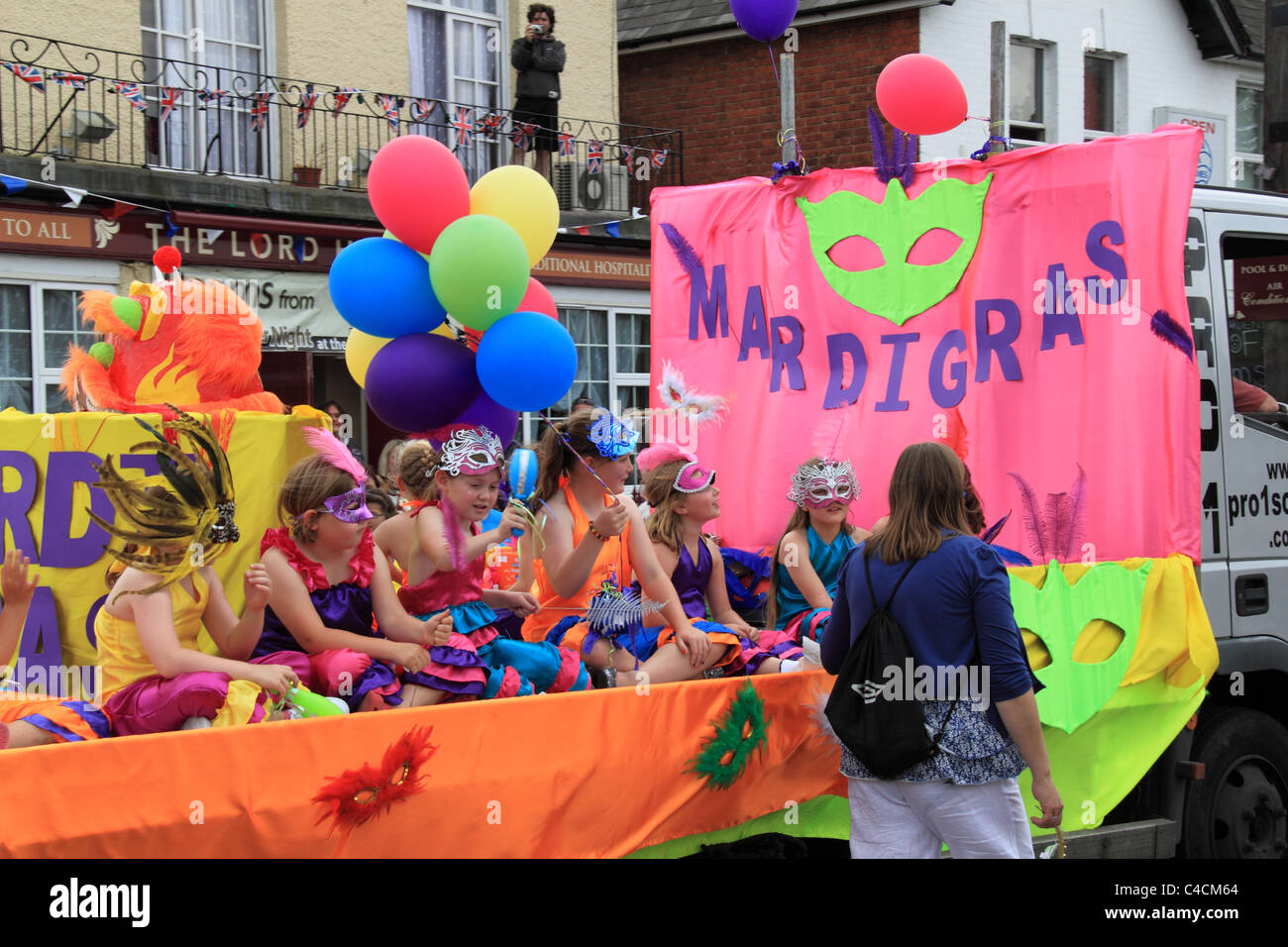 Mardi Gras float in Molesey Carnival procession Stock Photo - Alamy