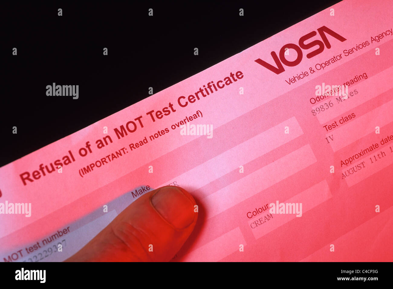 person holding mot test failure certificate for UK road vehicle Stock ...