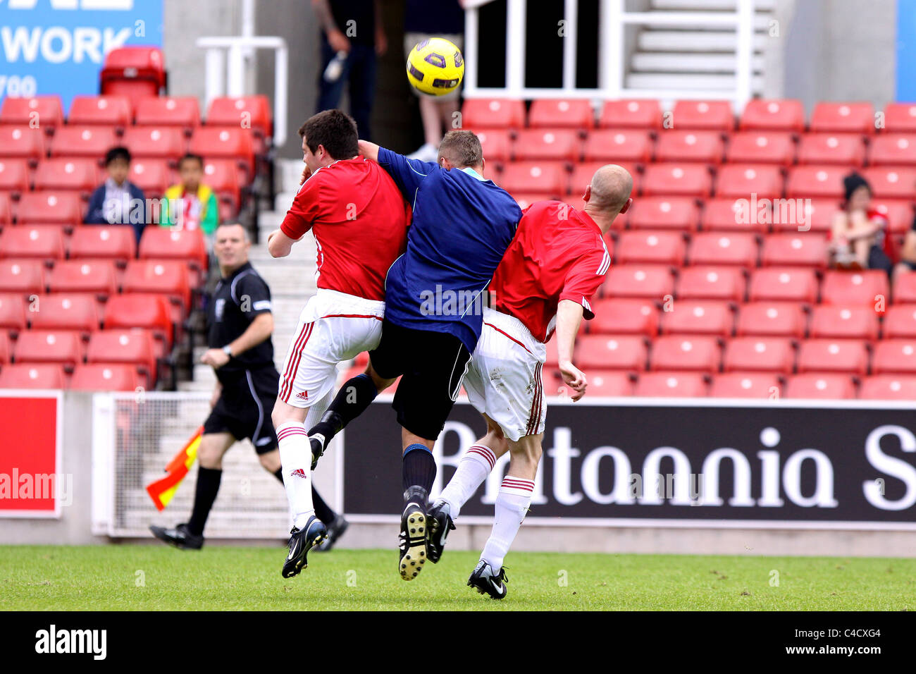 Compete for the ball Stock Photo - Alamy