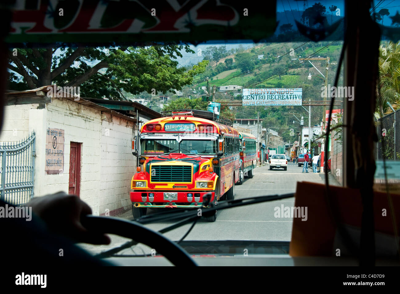 Riding in a Guatemalan "chicken bus" passing two oncoming buses in the ...