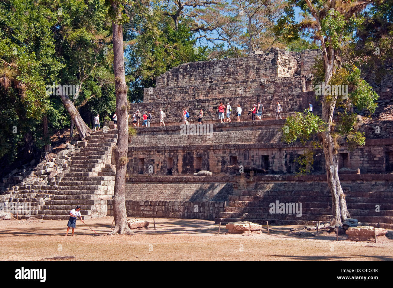 Tourists crossing the Temple of the Inscriptions on the West Court ...