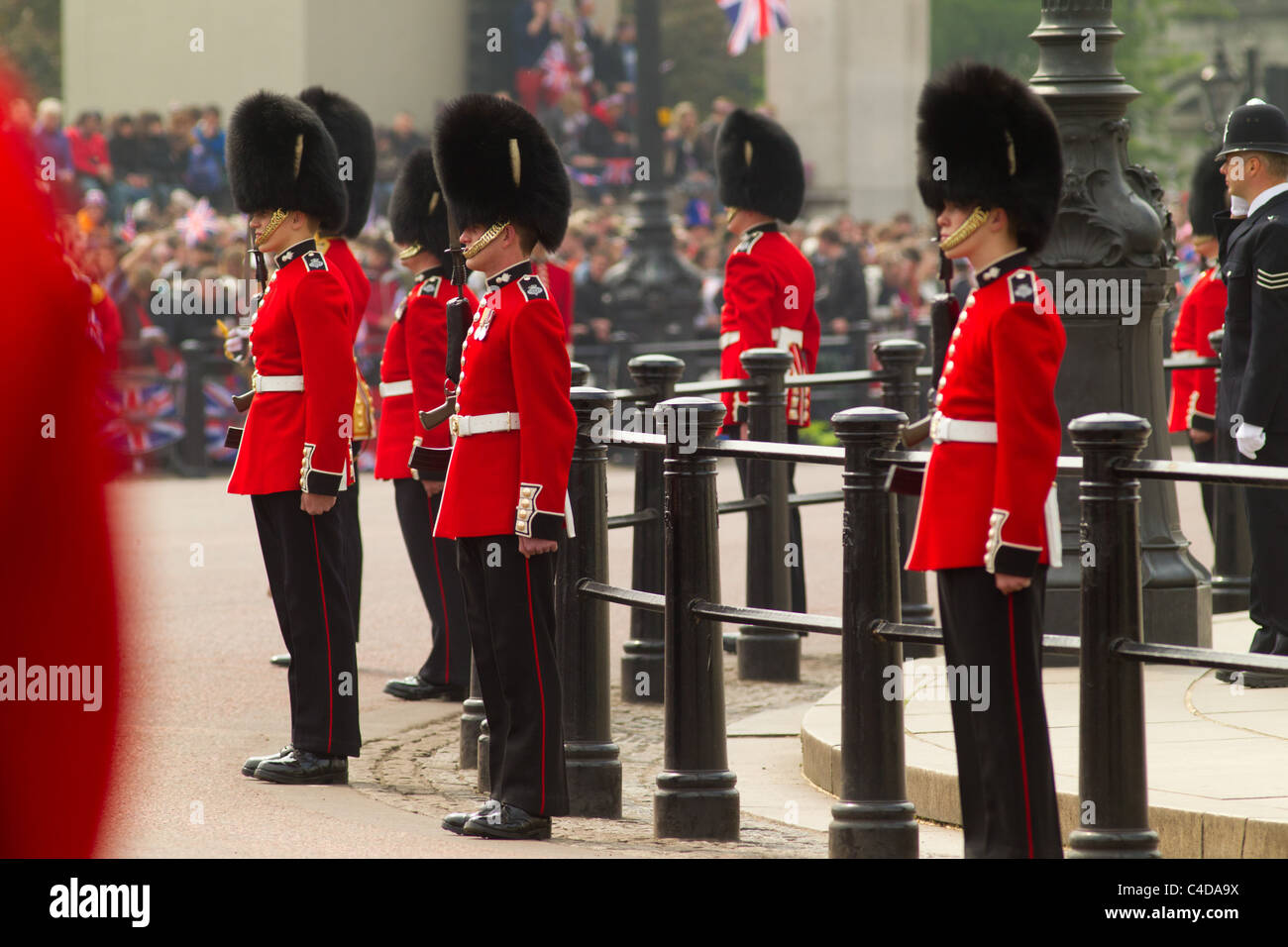 Coldstream Guards line the route for the royal wedding of Prince ...