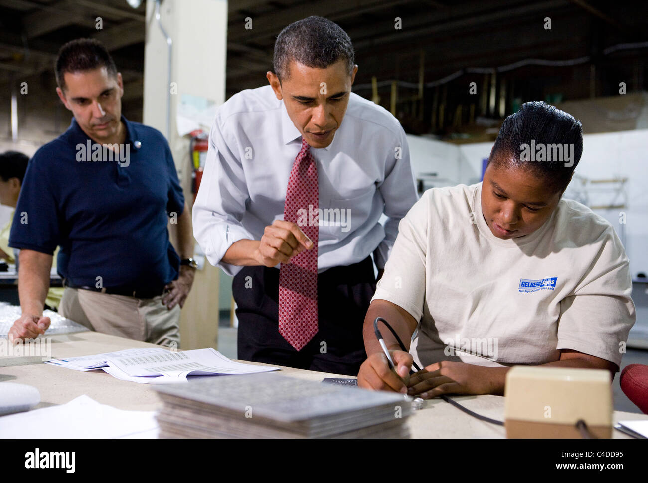 President Barack Obama visits a sign factory Stock Photo - Alamy