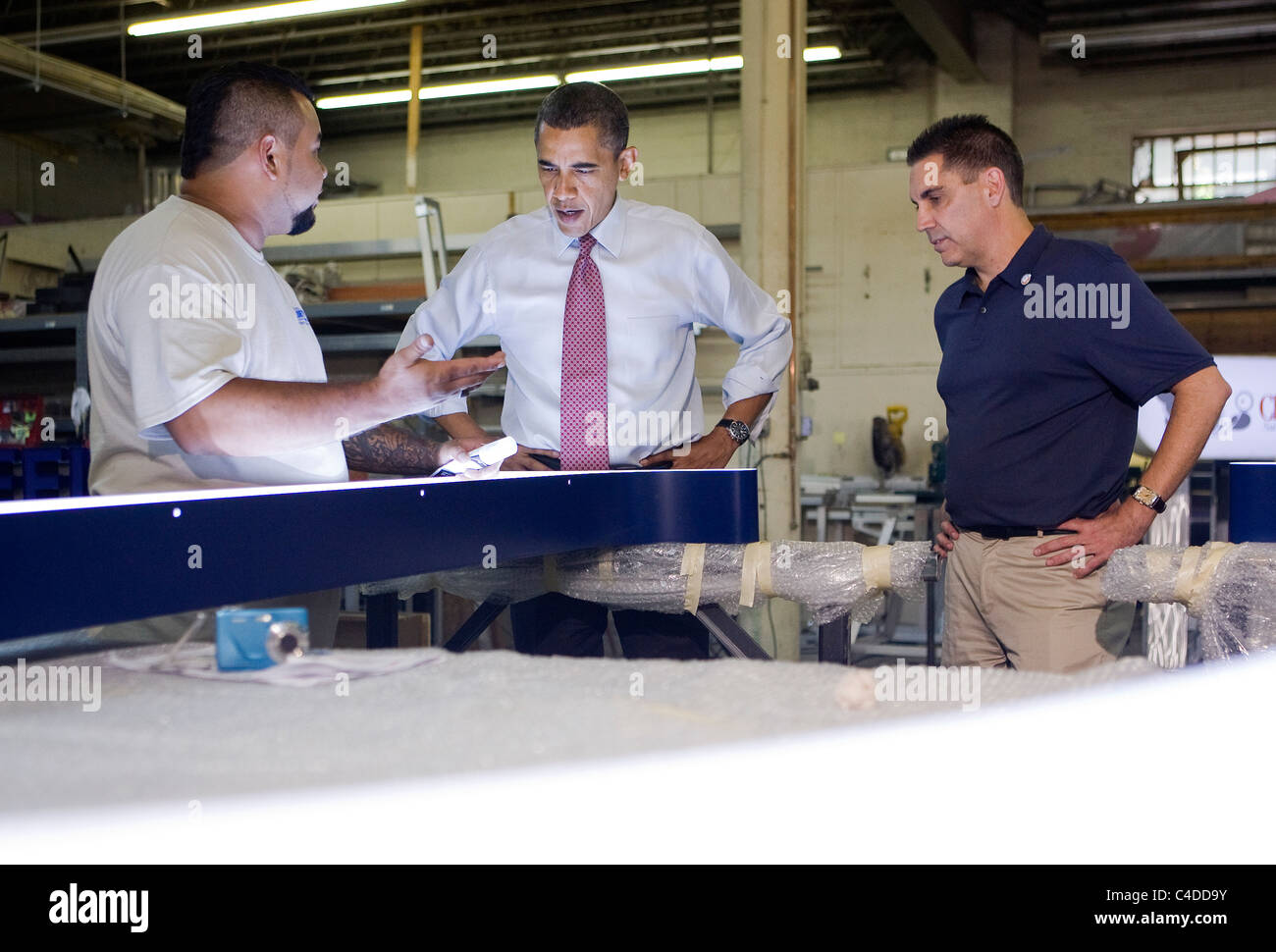 President Barack Obama visits a sign factory Stock Photo - Alamy