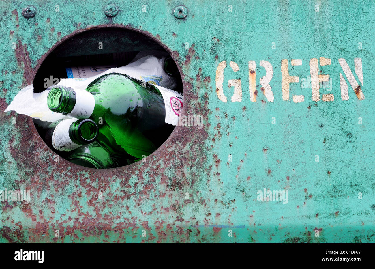 Green recycling port with bottles Stock Photo - Alamy