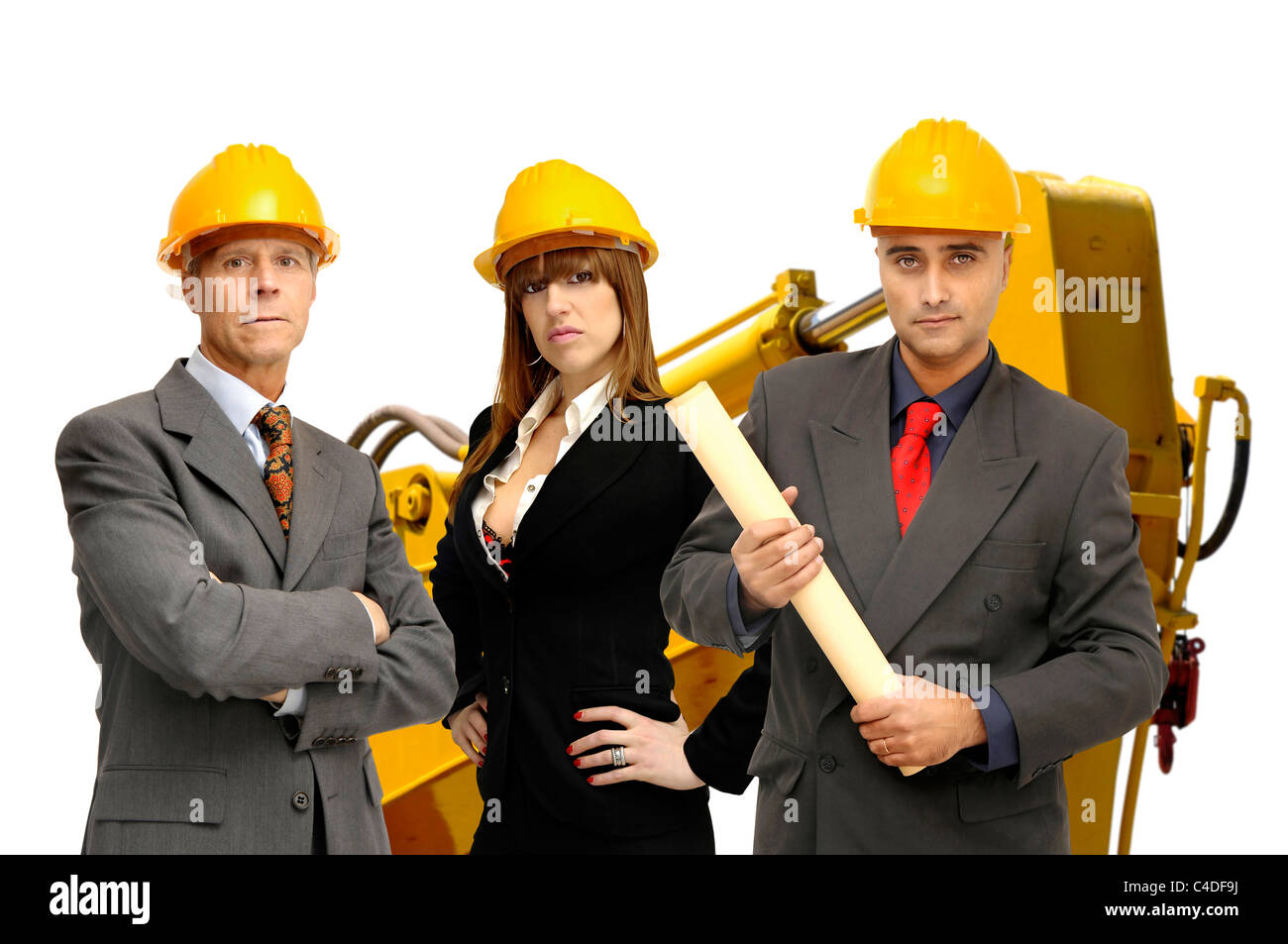 team of engineers isolated with a big machine in the background Stock ...