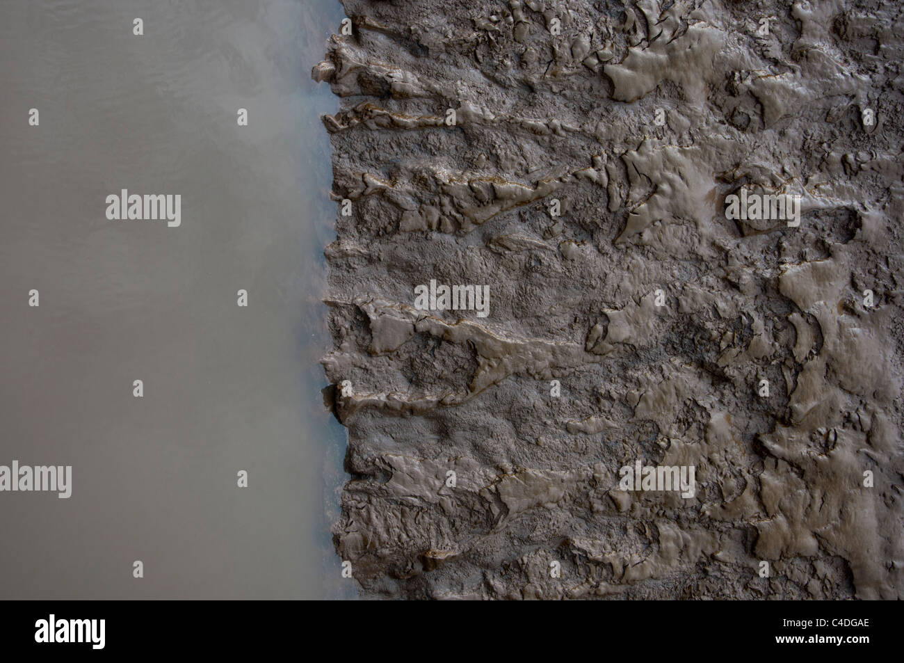 Tidal river mud Stock Photo - Alamy