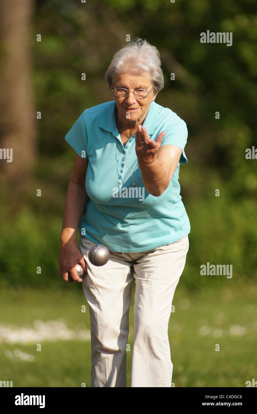 elderly woman playing boule in sweden Stock Photo - Alamy