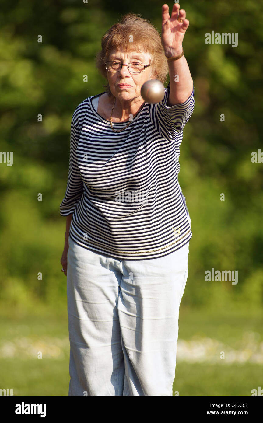 Woman playing boule hi-res stock photography and images - Alamy