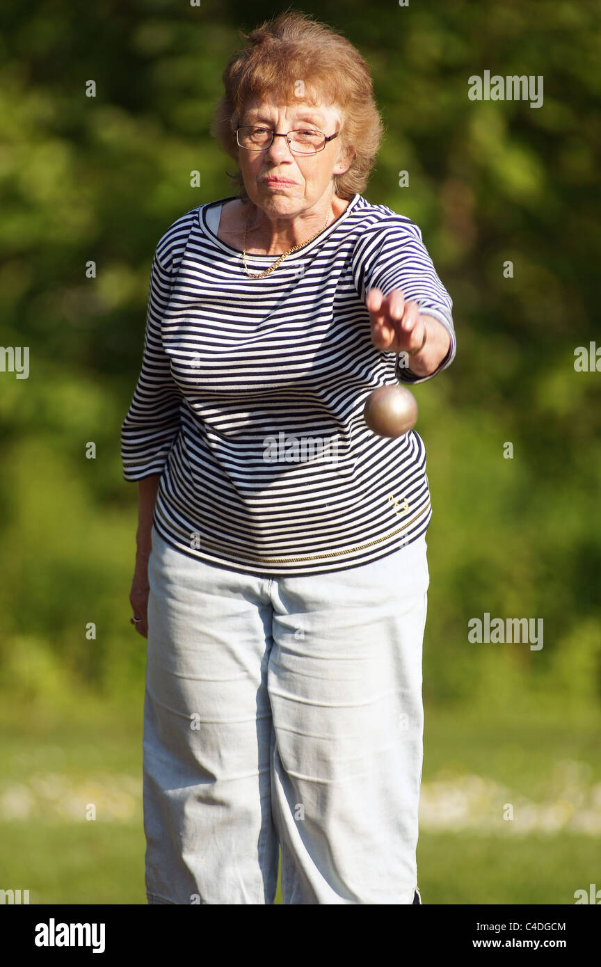 elderly woman playing boule in sweden Stock Photo - Alamy