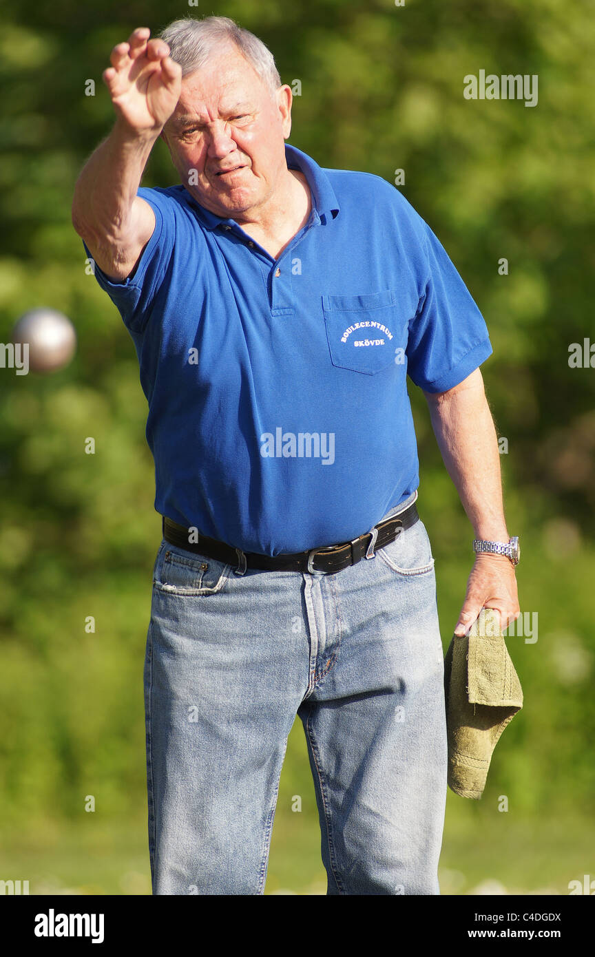 man playing boule in sweden Stock Photo - Alamy