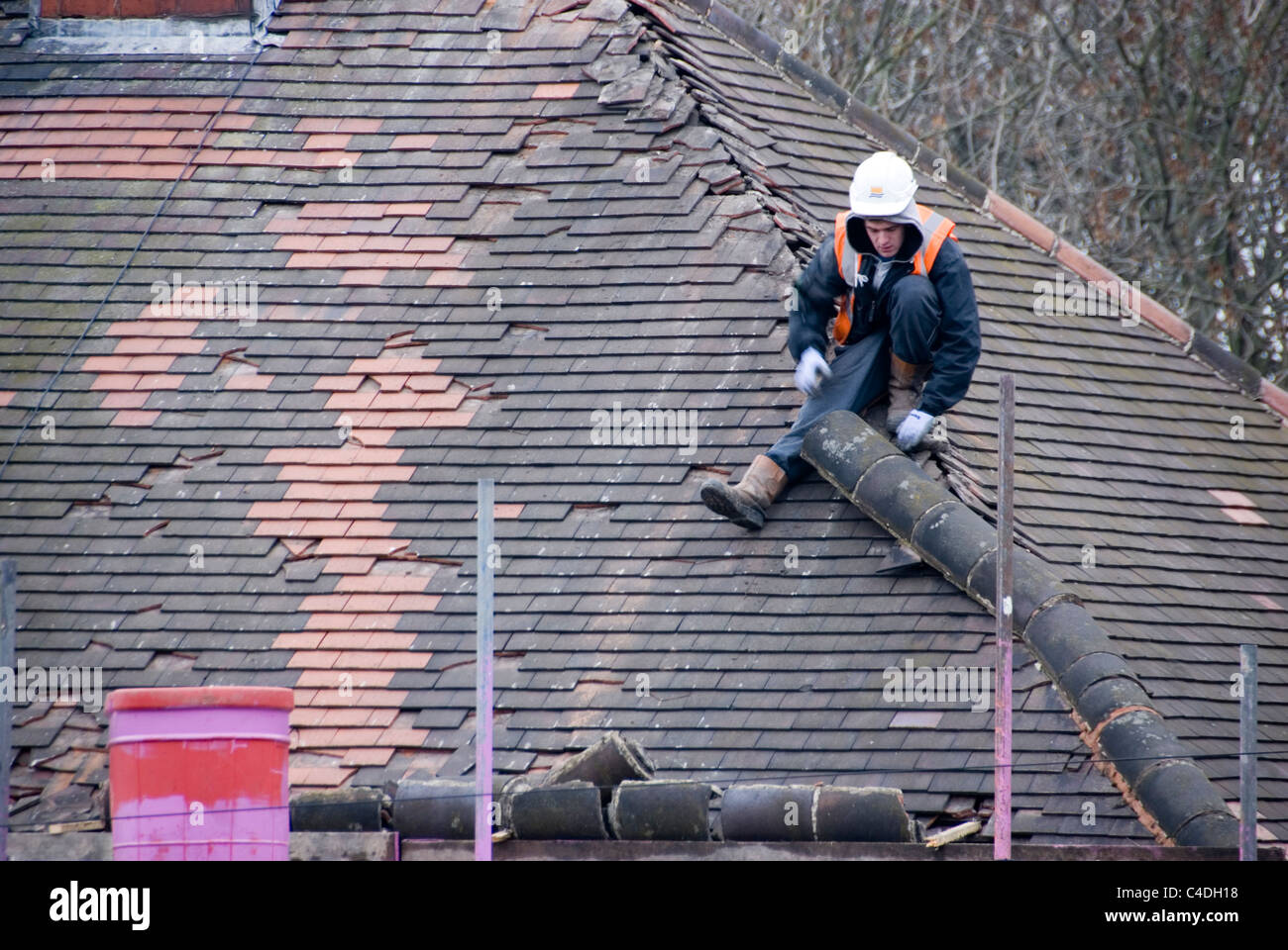 Removing ridge tiles hi-res stock photography and images - Alamy