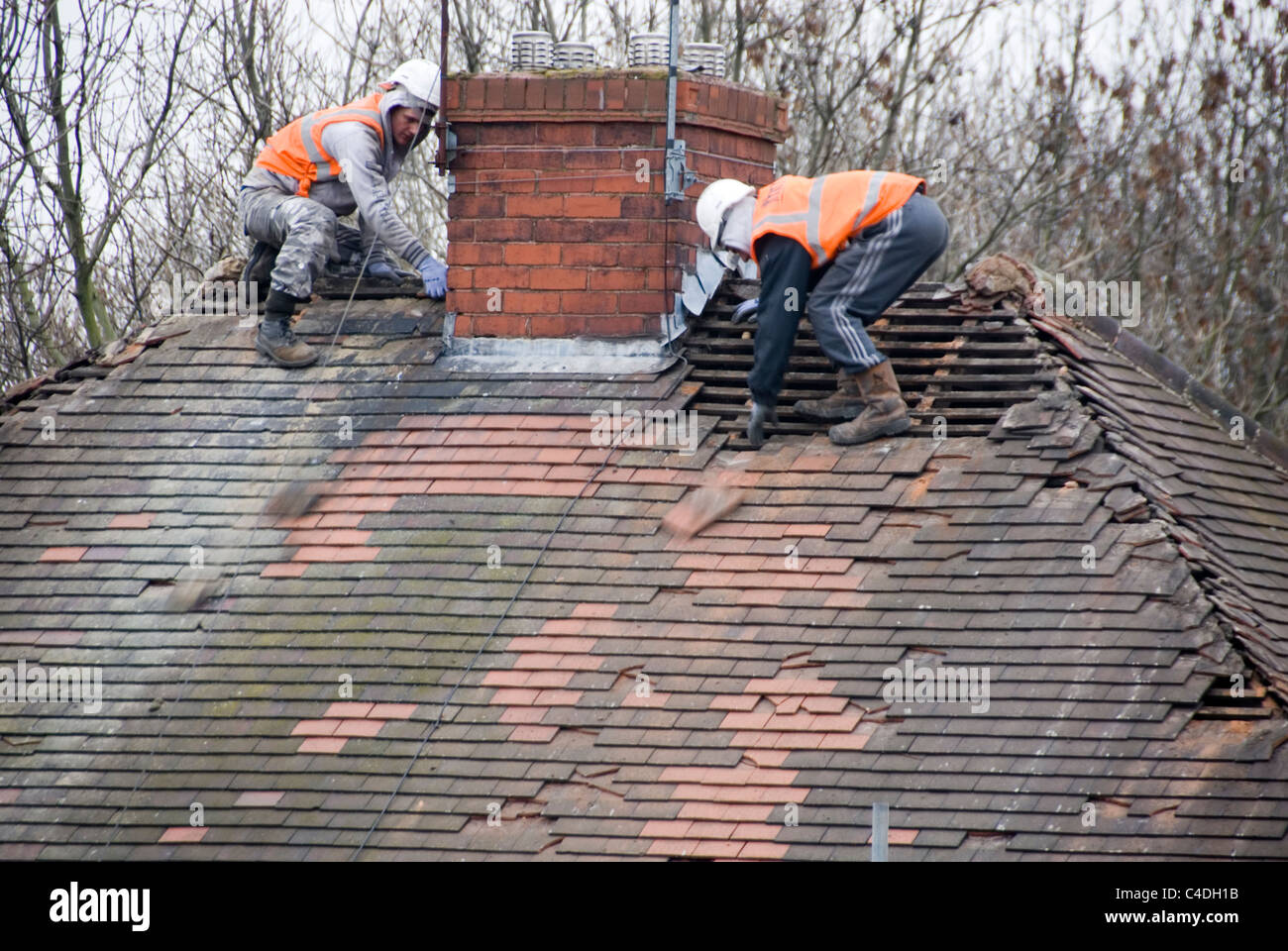 Two Men Roof of House Roof Stripping off Old Tiles, Re Roofing ACIS ...