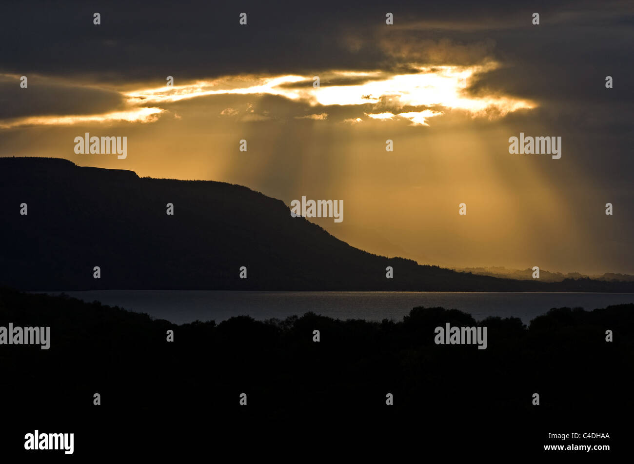 Dark dramatic skies over Lower Lough Erne, Cliffs of Magho, County ...