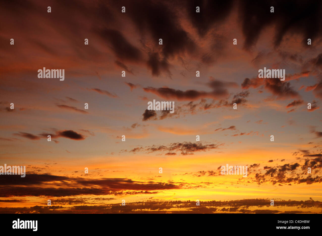 Scudding clouds at sunset Stock Photo - Alamy