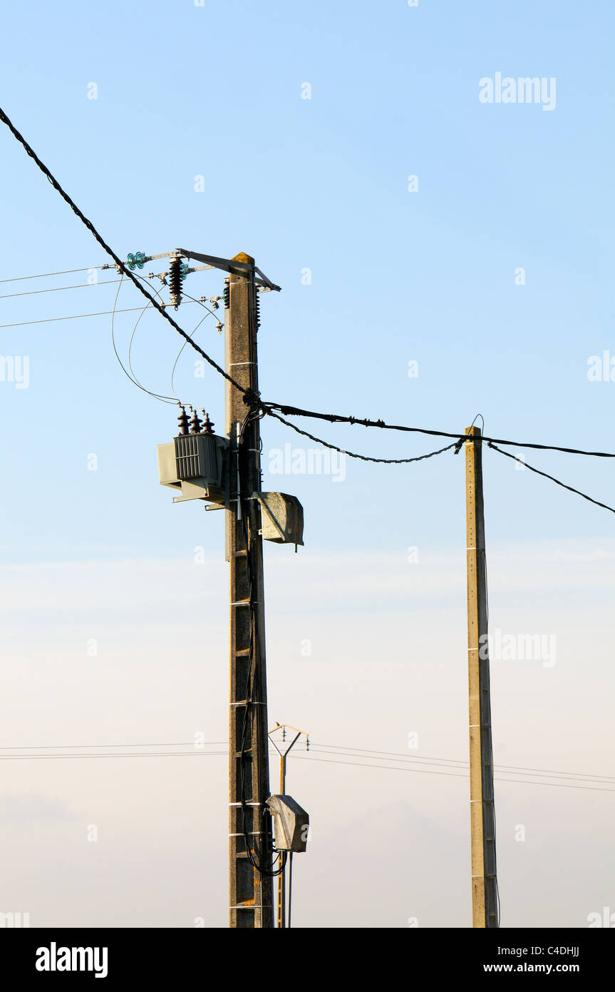 Electricity wires crossing over Stock Photo - Alamy