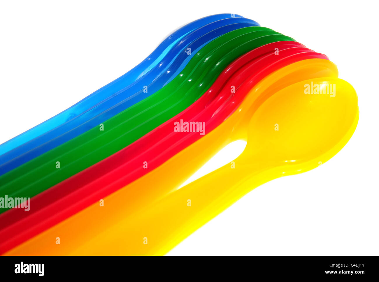 Twelve colorful spoons on a white background Stock Photo - Alamy