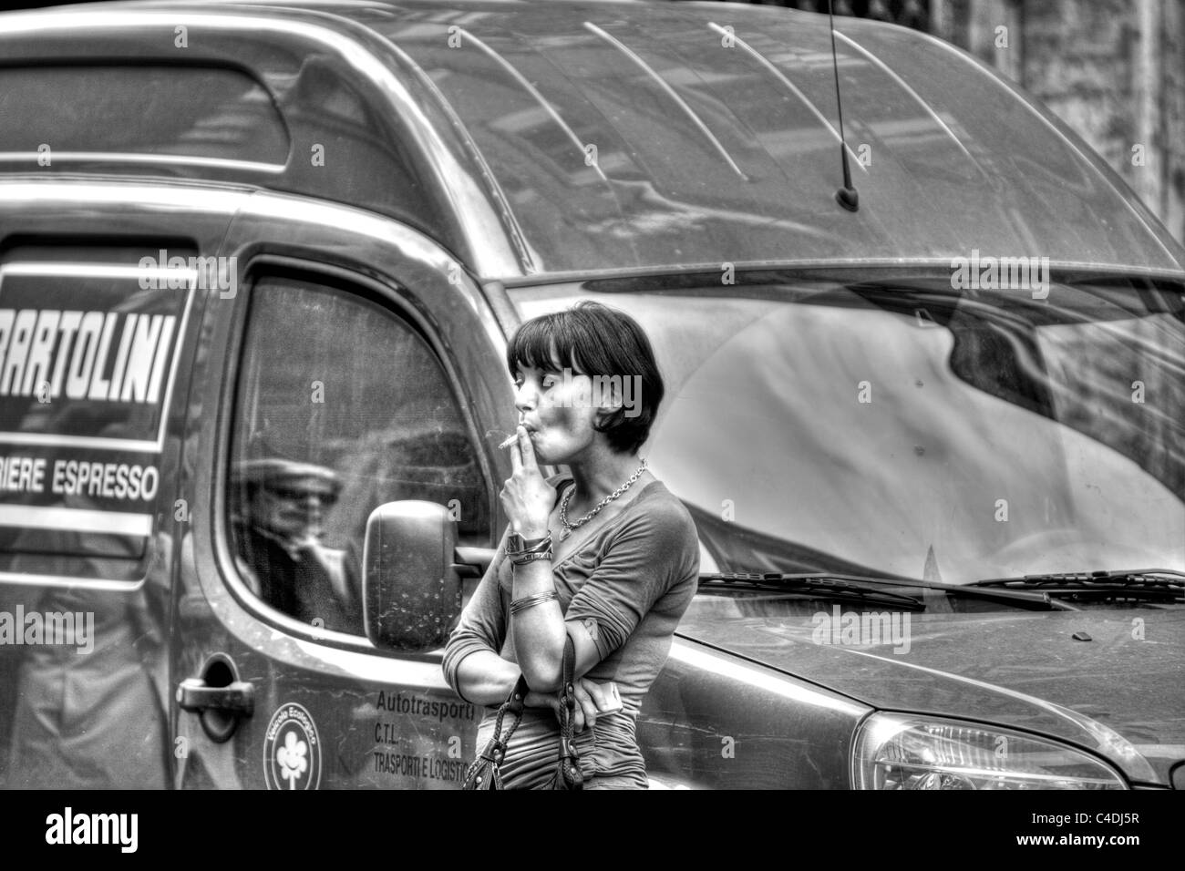 Lady smoking a cigarette hi-res stock photography and images - Alamy