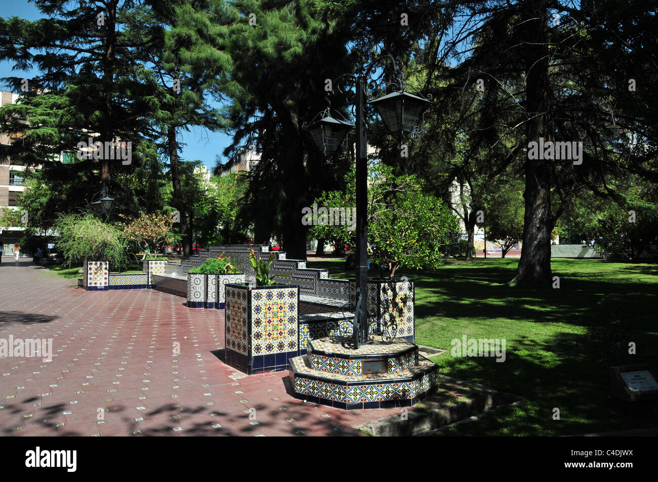 Sun shade red mosaic tiles path with white blue mosaic tiles raised ...