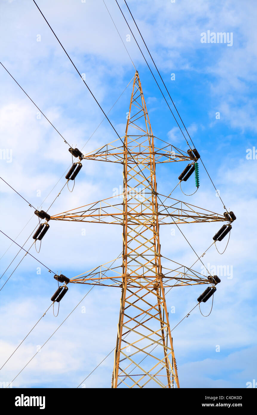 Power line pillar against a cloudy background Stock Photo - Alamy