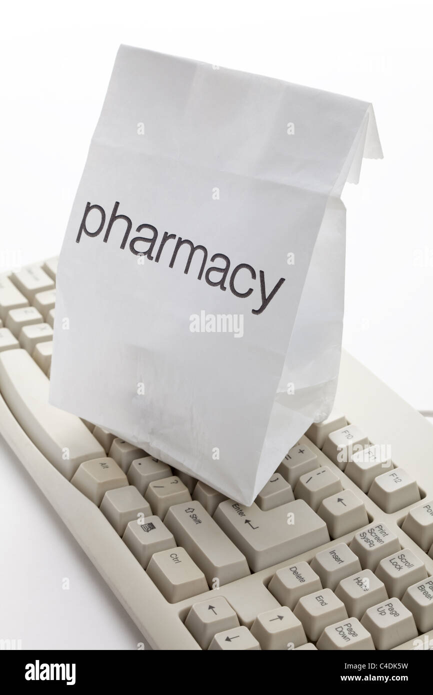 Pharmacy Bag and computer keyboard Stock Photo - Alamy
