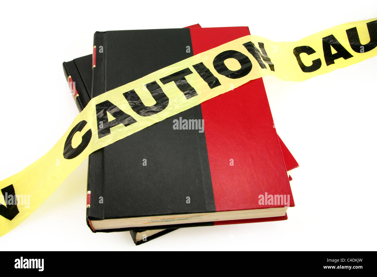 plastic caution tape and book, forbidden book Stock Photo - Alamy