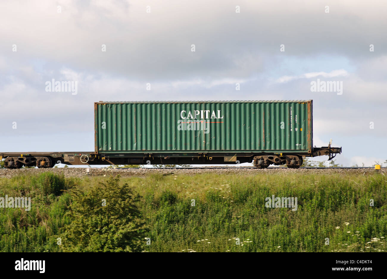 Capital shipping container on train Stock Photo - Alamy