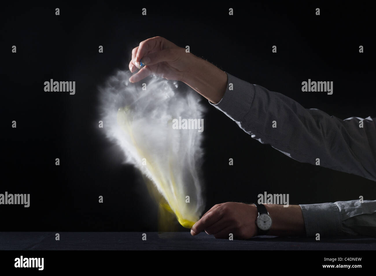high speed flash capturing bursting balloon and visible sound wave ...