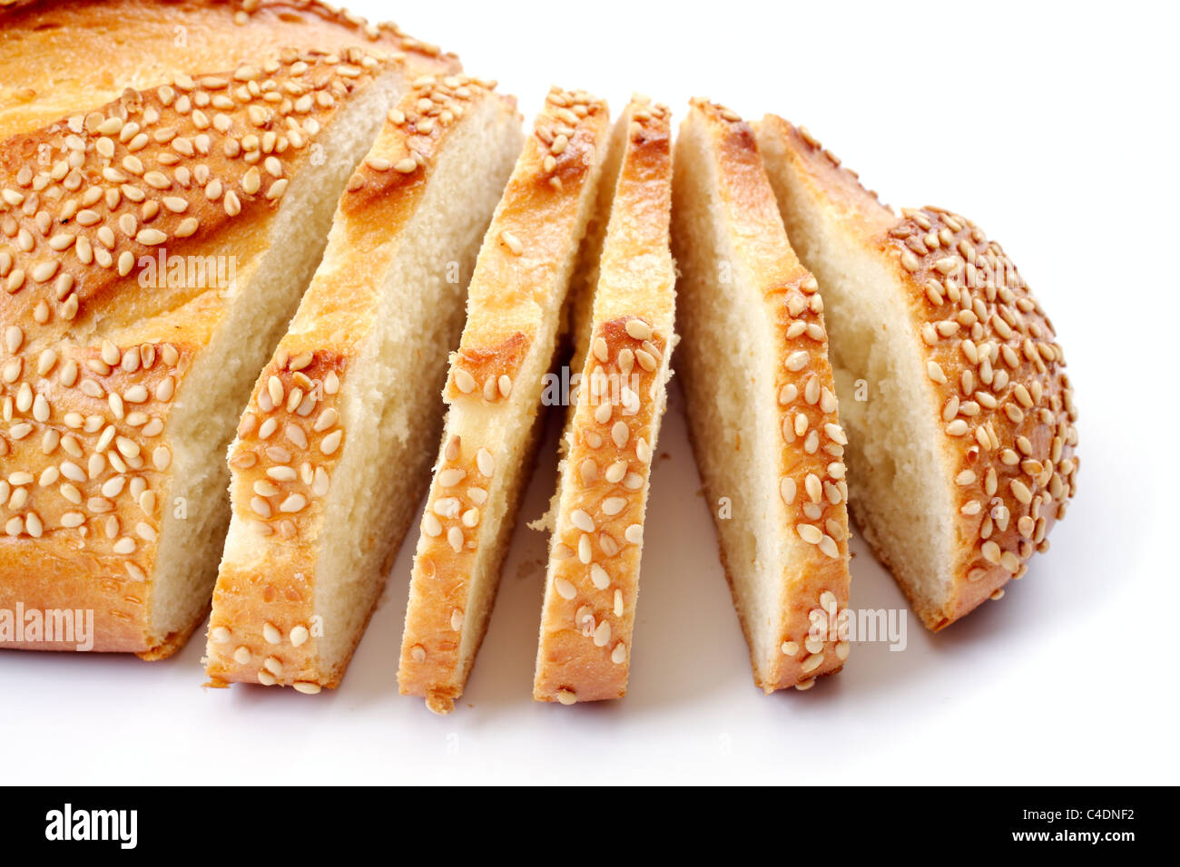Bread with a sesame, over white Stock Photo - Alamy