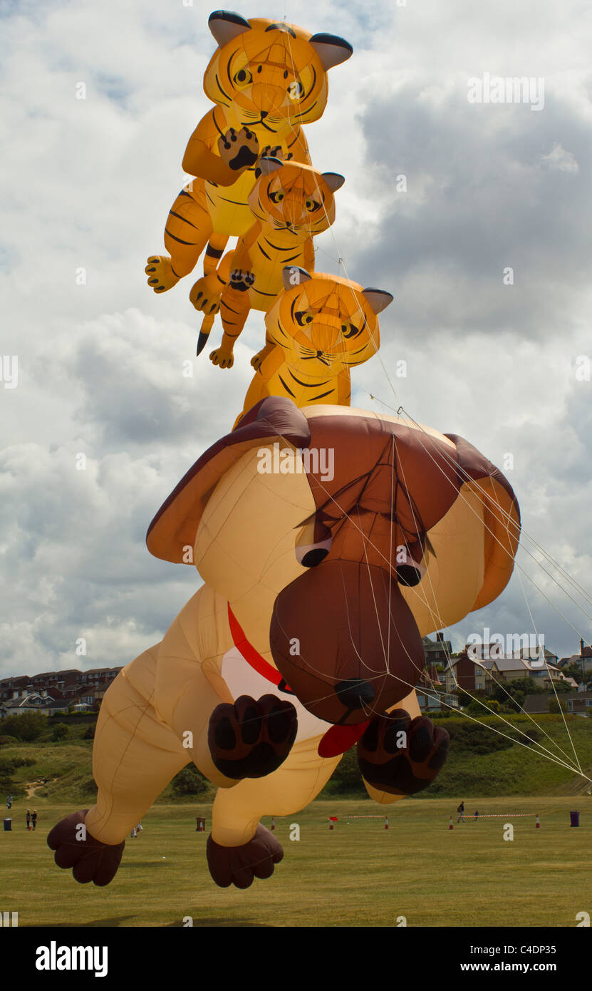 Inflatable dog and tiger kites at the Wirral International Kite ...