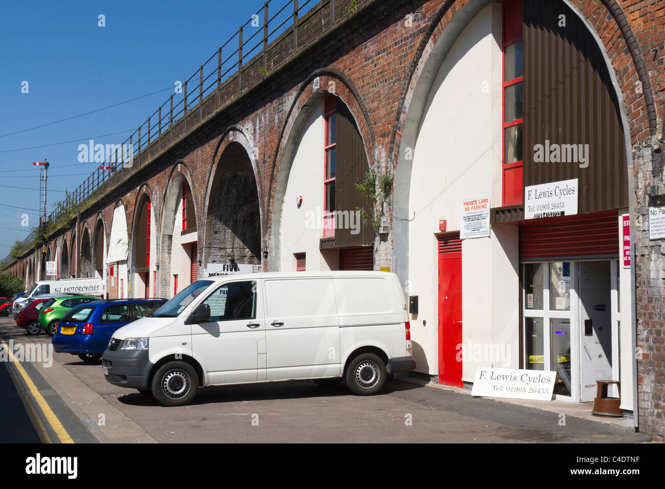 Small businesses located under railway arches in Worcester Stock Photo ...