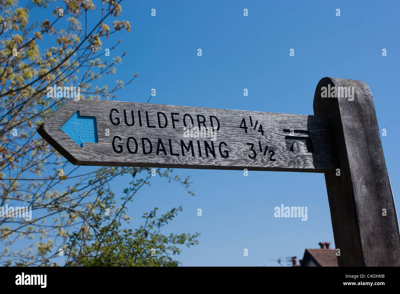 Signpost to Guildford and Godalming Stock Photo - Alamy