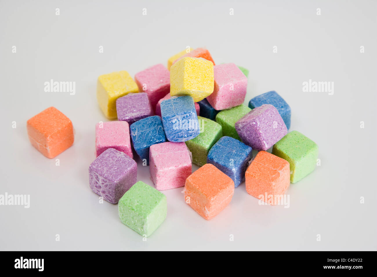 Bath salt cubes on white background Stock Photo - Alamy