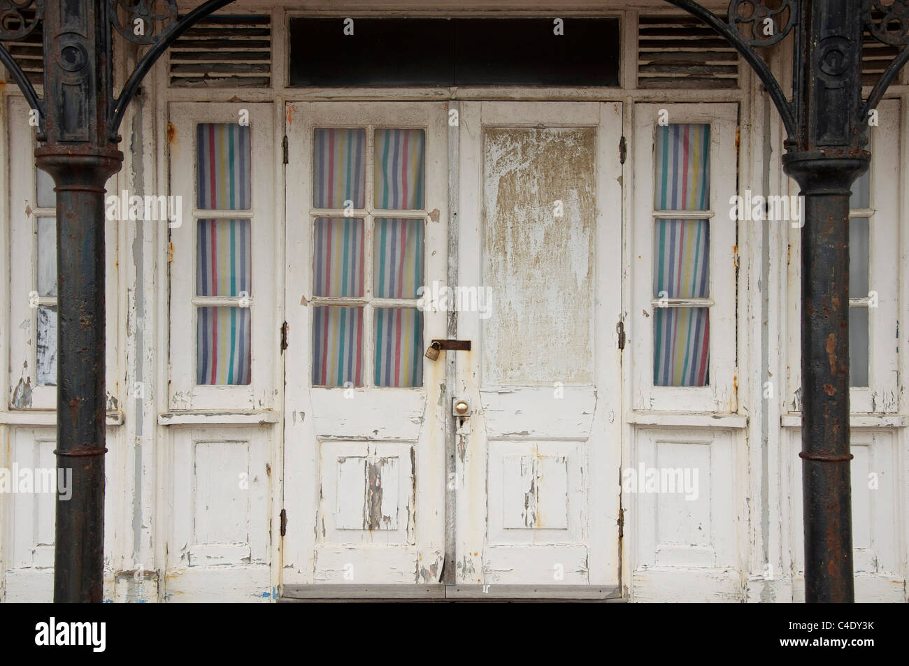 Beach huts in winter, on Weymouth seafront. It is out of season, they ...
