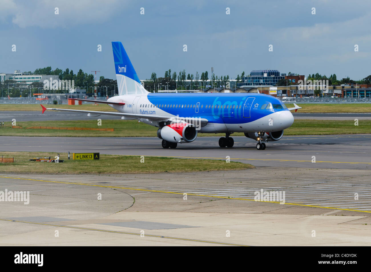 BMI A319 plane taxiing for takeoff. BMI was bought over by British ...