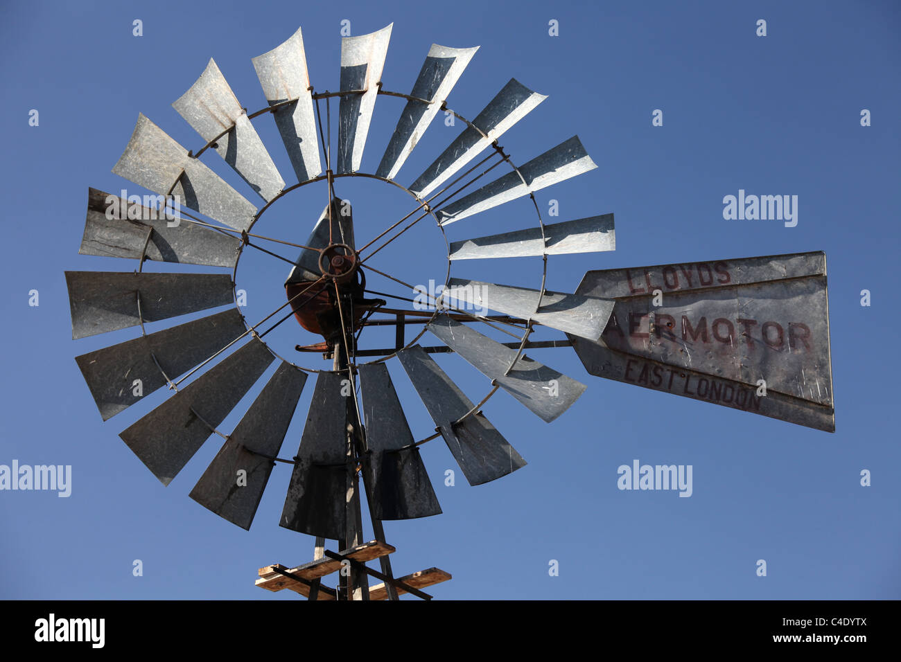An old wind pump windmill in Namibia, manufactured in East London ...