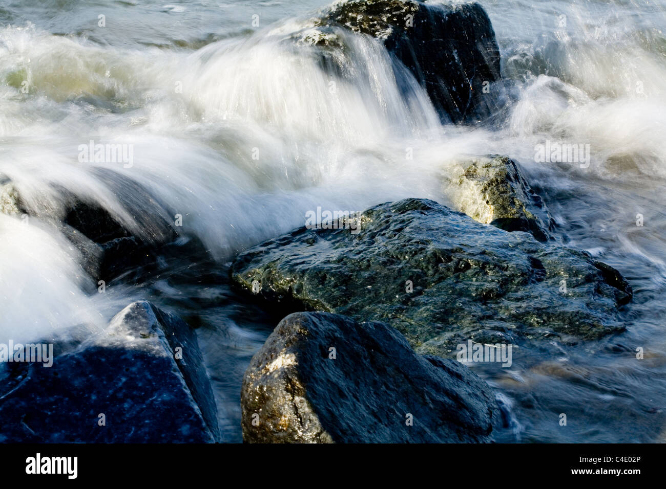 Flowing river Water close up Stock Photo - Alamy
