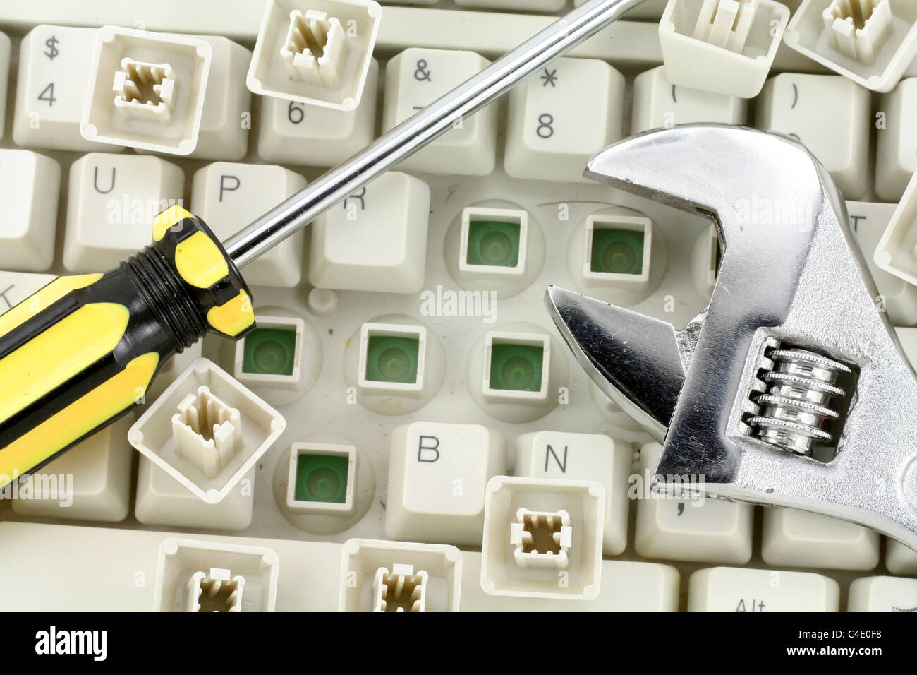 Adjustable Wrench and keyboard, concept of computer repairing Stock ...