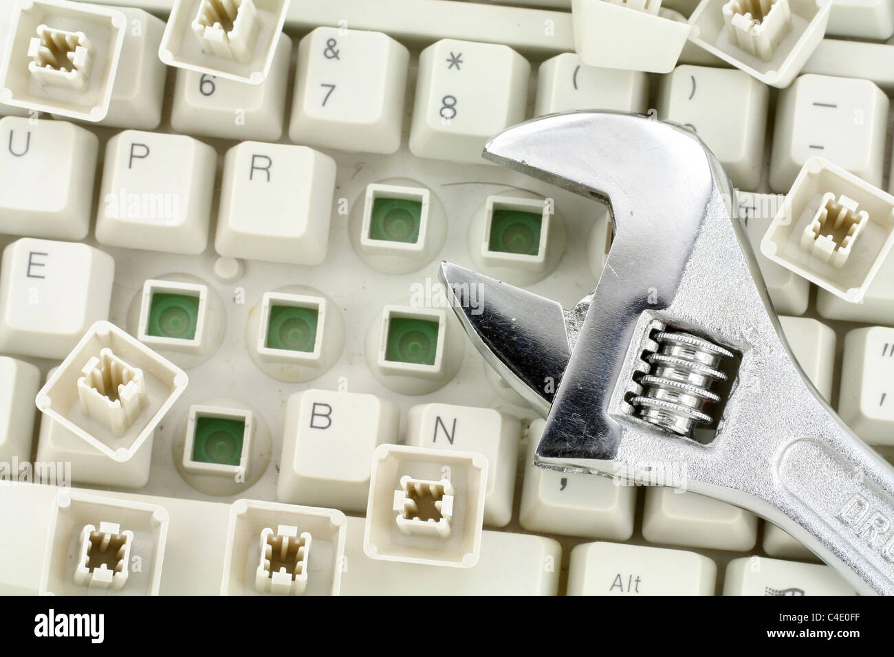 Adjustable Wrench and keyboard, concept of computer repairing Stock ...