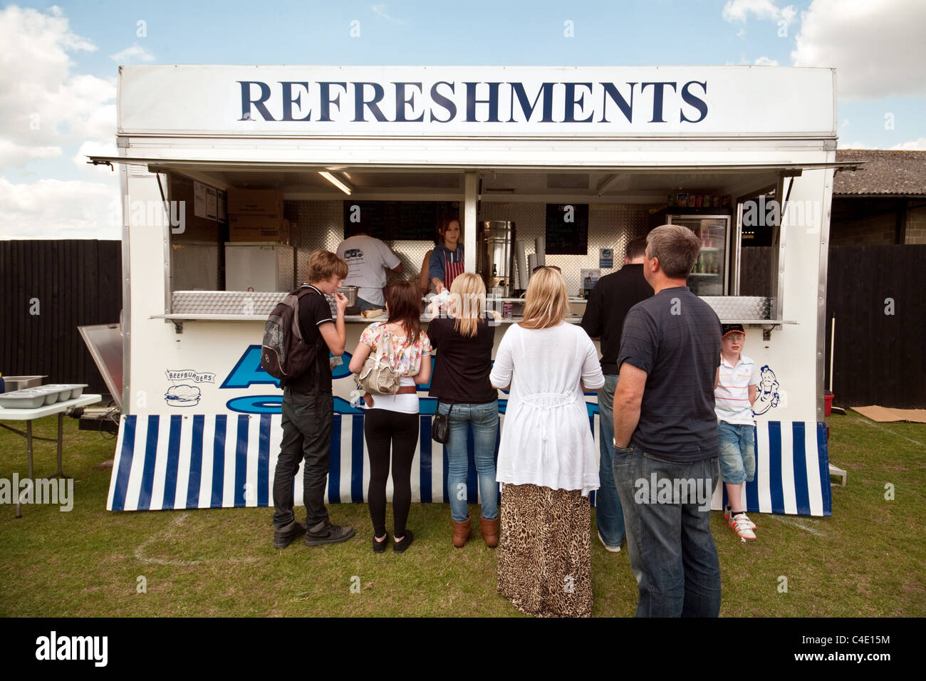 A queue at a refreshments stall Stock Photo - Alamy