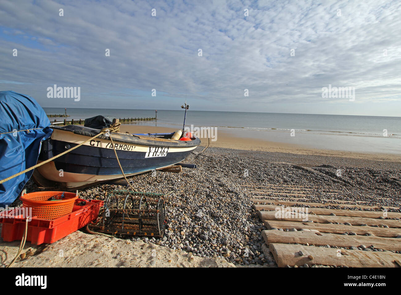 A fishing boat at Sheringham, Norfolk recently winched up the beach ...
