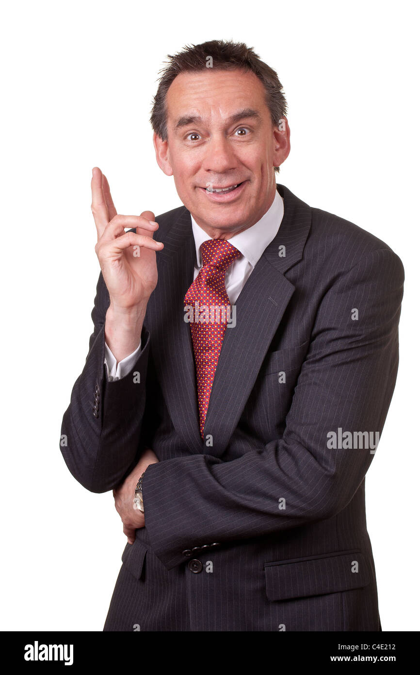 Attractive Business Man in Suit with Silly Grin Stock Photo - Alamy