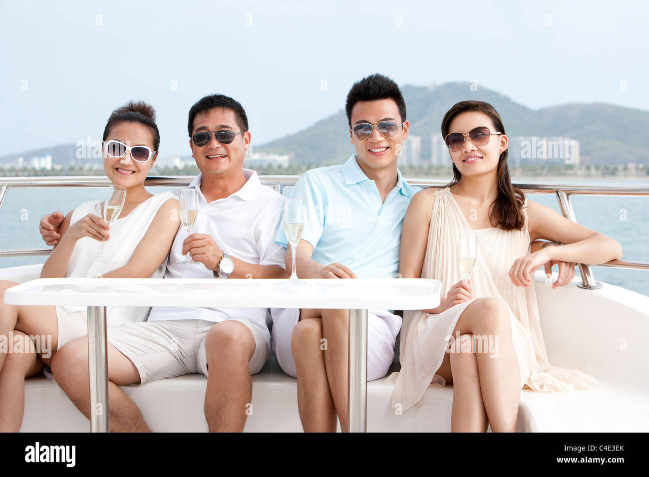 Friends Relaxing on a Yacht Stock Photo - Alamy