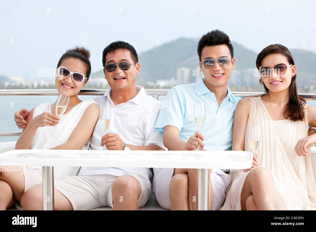 Friends Relaxing on a Yacht Stock Photo - Alamy