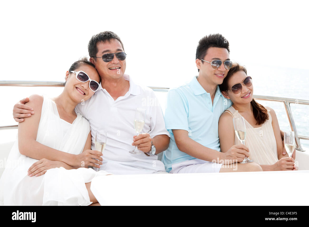 Friends Relaxing on a Yacht Stock Photo - Alamy
