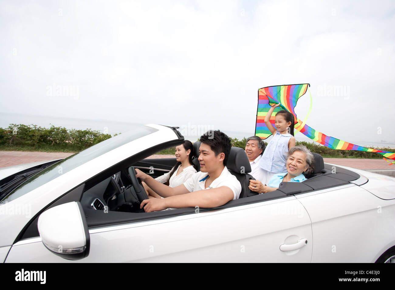 Family driving car beach road hi-res stock photography and images - Alamy