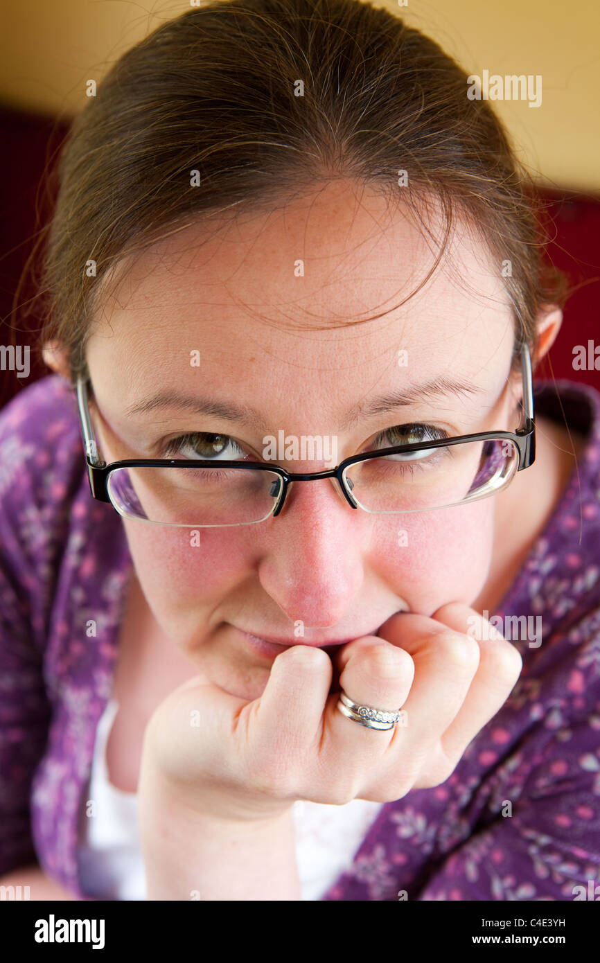 A young lady thinking Stock Photo - Alamy