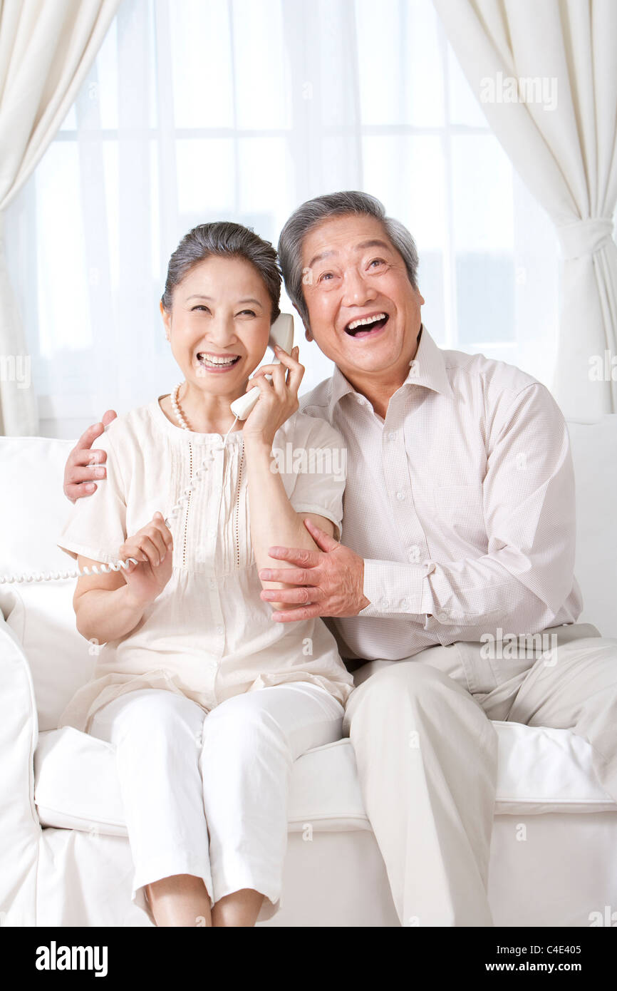 Couple On the Phone Stock Photo - Alamy