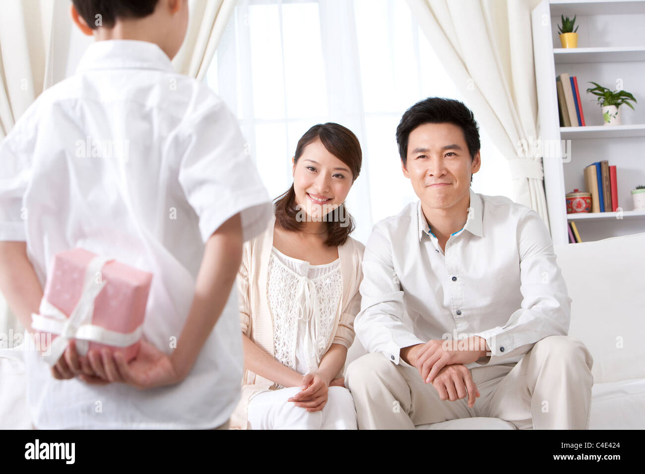 Giving Gifts to Parents Stock Photo - Alamy